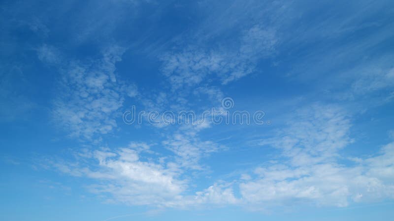 Light High Clouds Slide on Sky. Layer of Clouds in Blue Sky Moving ...