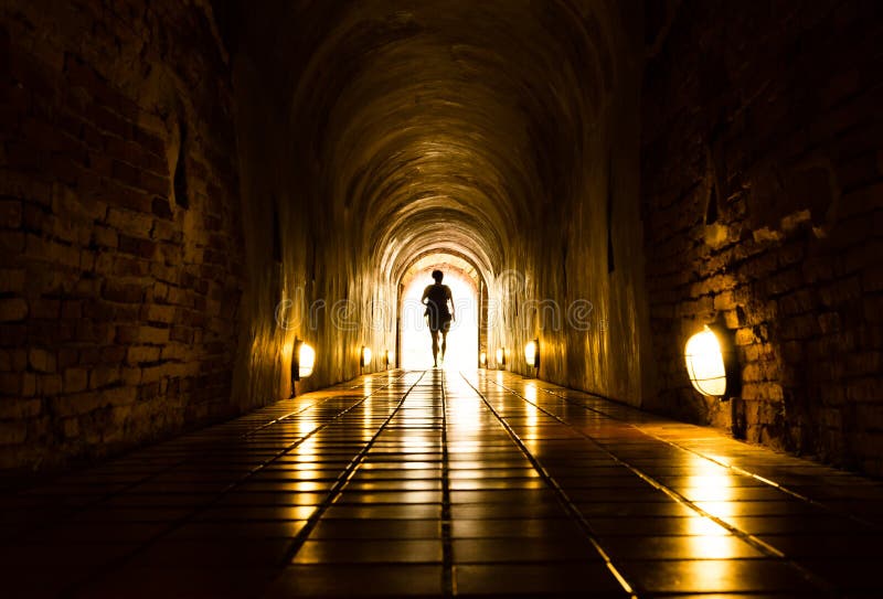 Light and Human at End of Tunnel Stock Image - Image of male, passage ...