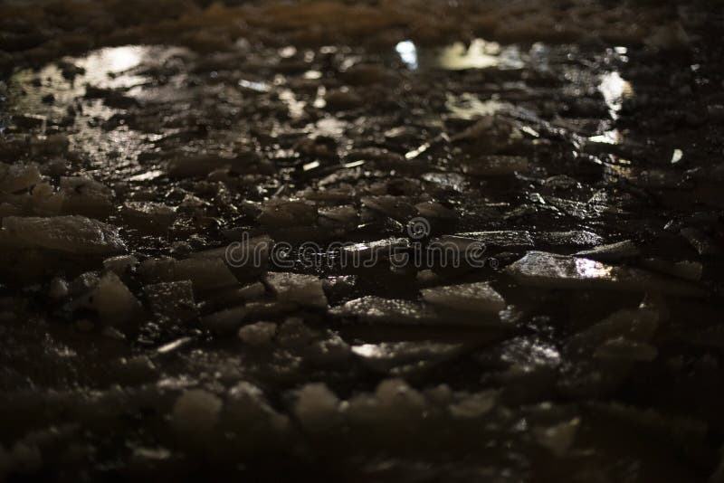 Light on Ice in Dark. Reflection of Artificial Light on Frozen Water ...