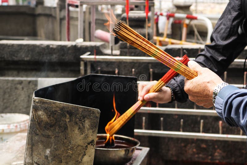 Light the Incense Sticks by the Fire of Lanterns Stock Image - Image of ...