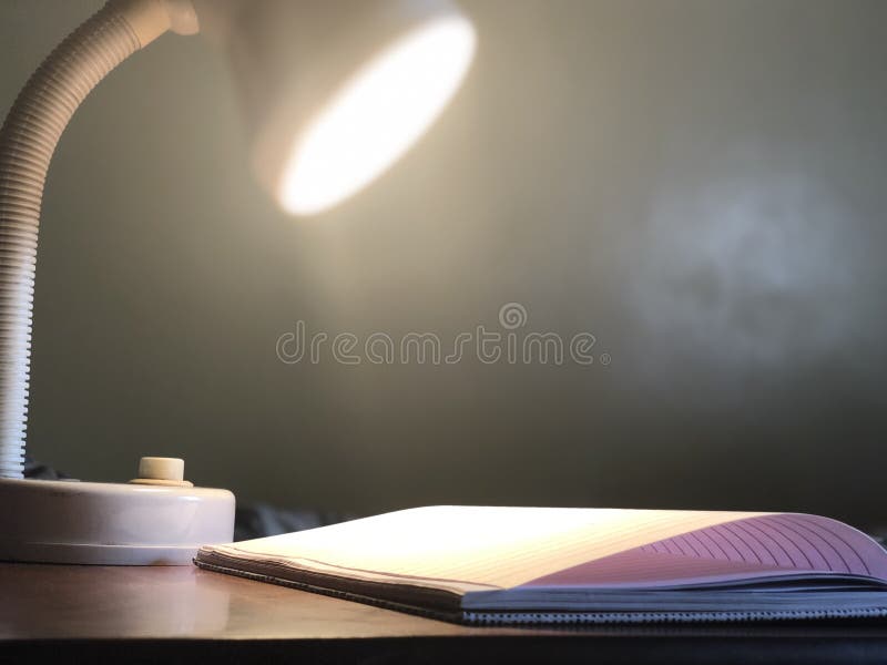 Light Lamp Shining on Open Book Stock Photo - Image of stage, open ...