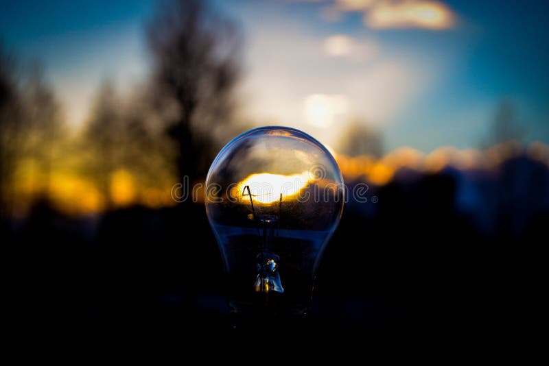 Light in the lamp stock image. Image of sunset, bulb - 61978211