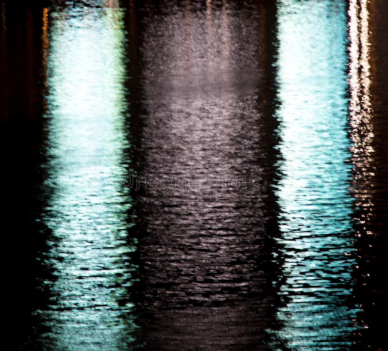 Light of Lanterns on the Smooth Surface of Water at Night As a ...