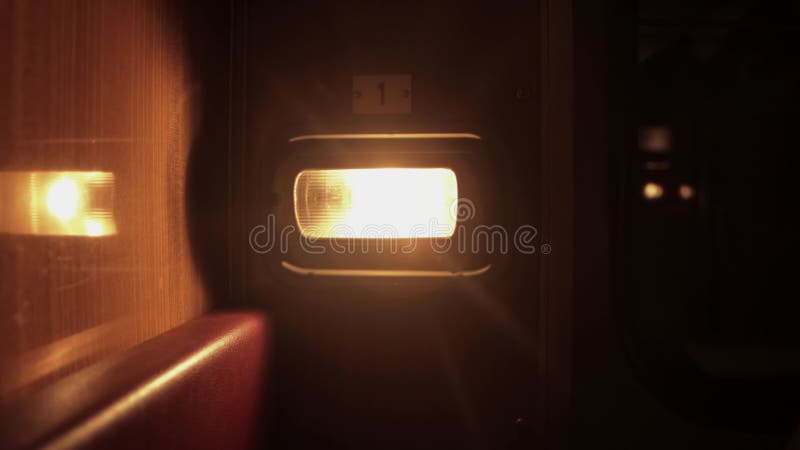Light from Luminaire is Lit Inside Railway Passenger Train Carriage ...