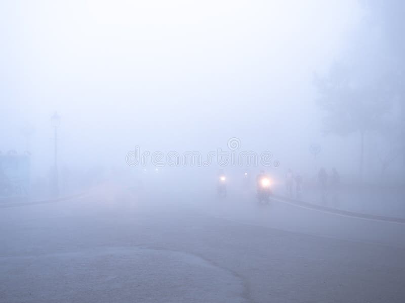 Light from Motocycles on the Intersection on the Day of Fog Stock Photo ...