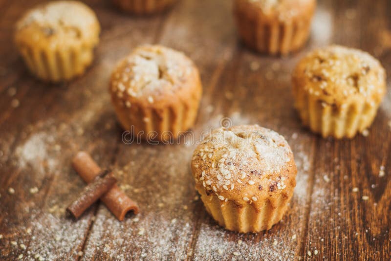 Light Muffins with Sesame on Wooden Background Stock Image - Image of ...
