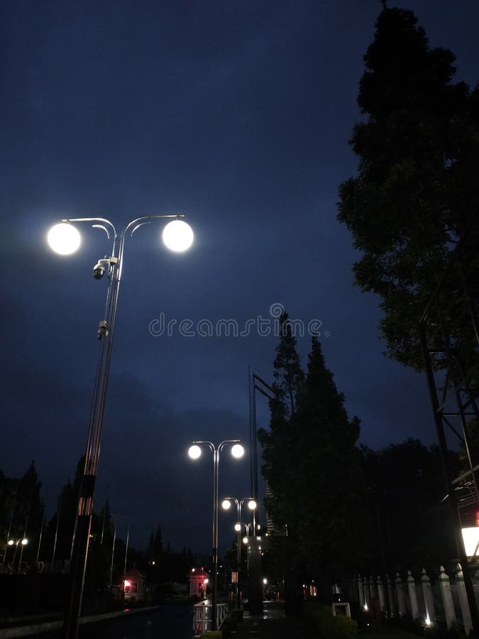 Light at Night when it& X27;s Drizzling Stock Image - Image of tree ...