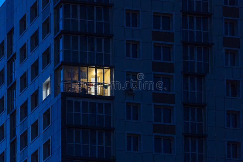 The Light is on in One Window of a High-rise Building Stock Photo ...