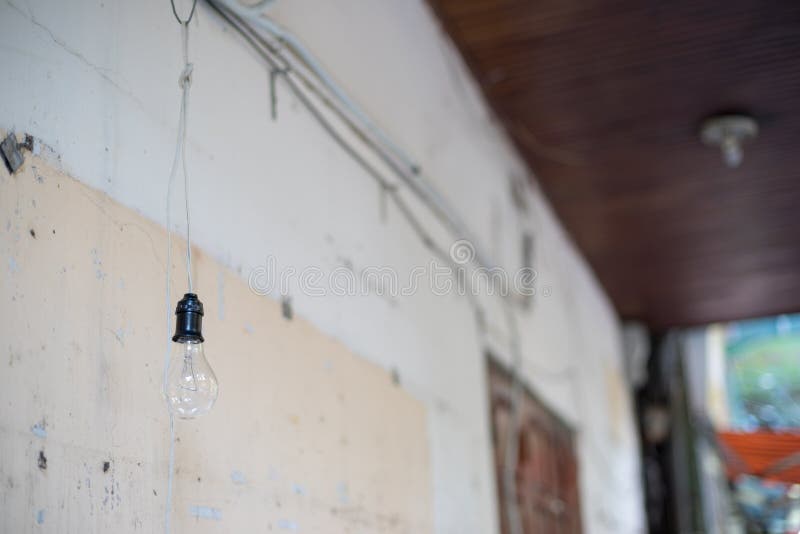 Light Out Hanging Lamp beside the Wall Stock Image - Image of white ...