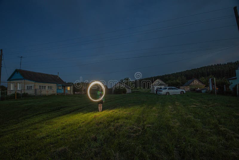 Light Painting with a Flashlight at Dusk Stock Photo - Image of motion ...