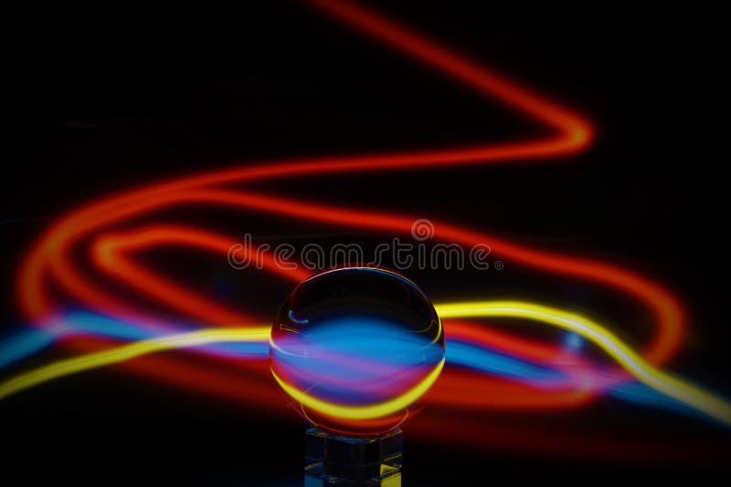 Light Painting Using a Glass Ball with Colours Red, Yellow and Blue ...