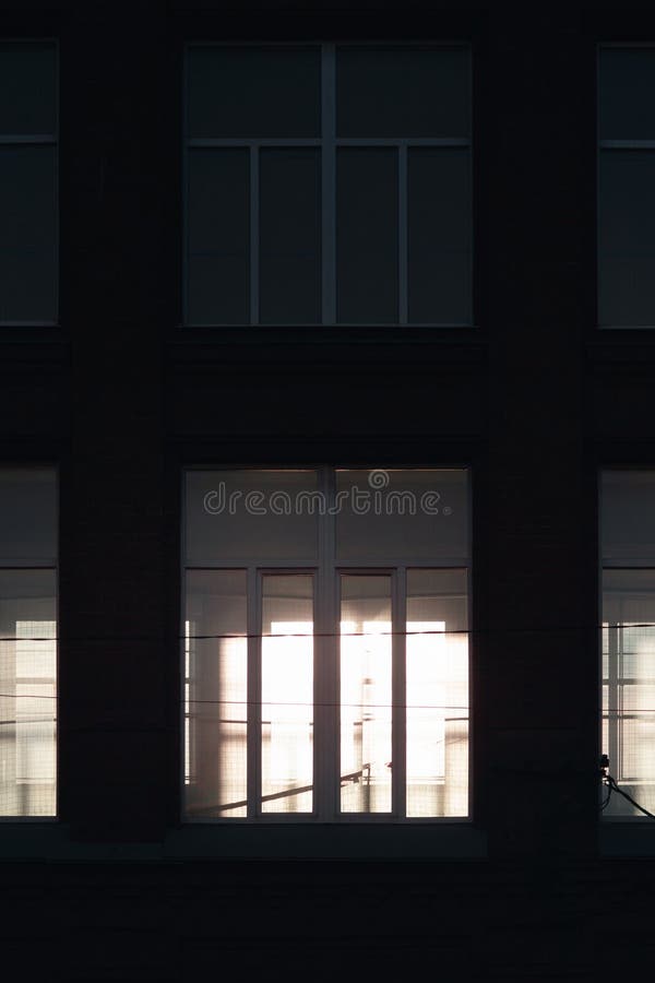 A Light Passing through a Window in the Dark Foreground Stock Photo ...