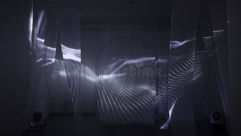 Light Patterns Projected on Fabric in Dark Room. Action Stock Image ...