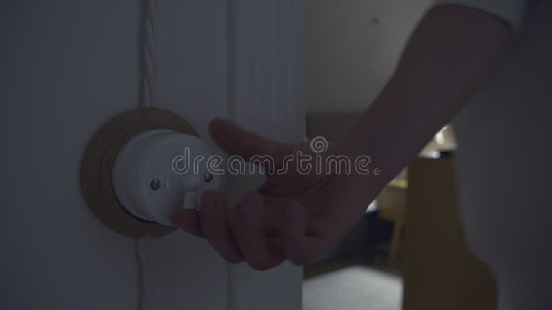 Light on. Person Walk in in the Dark Room and Switch on Retro Light ...