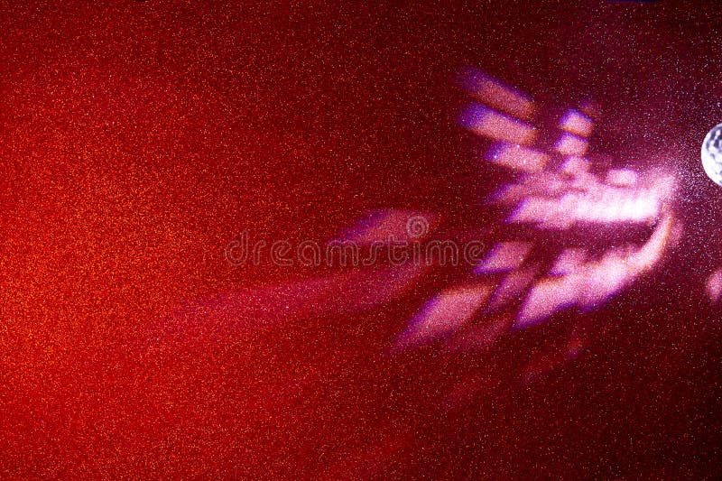 Light Pink Beams of Light on a Gradient Red Finely Grained Background ...