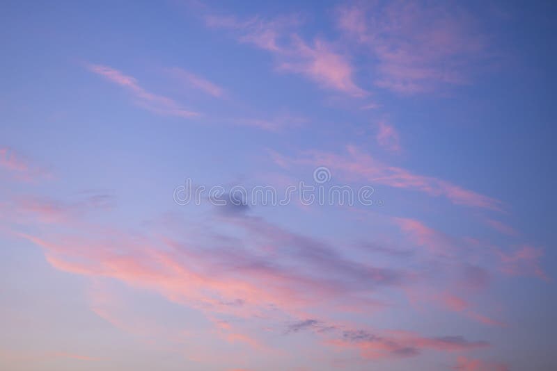 Light Pink Clouds in the Blue Sky. Sunset Stock Photo - Image of ...