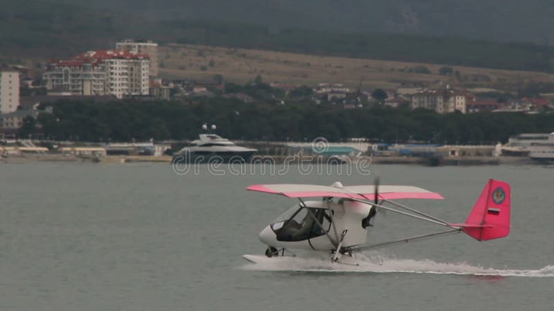 Light Plane Float on Water Surface Stock Video - Video of seaside ...