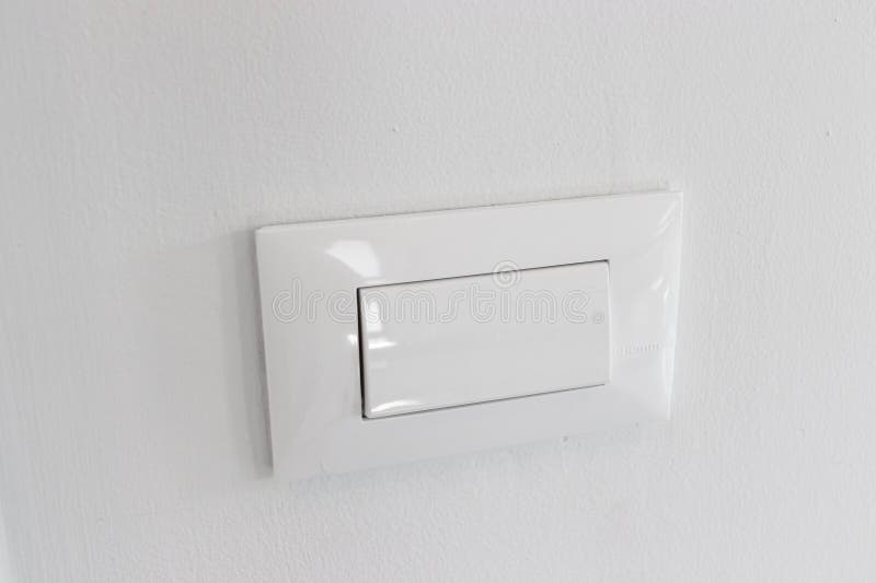 Light Switch, Mechanical Switch of White Color Installed on a Light ...