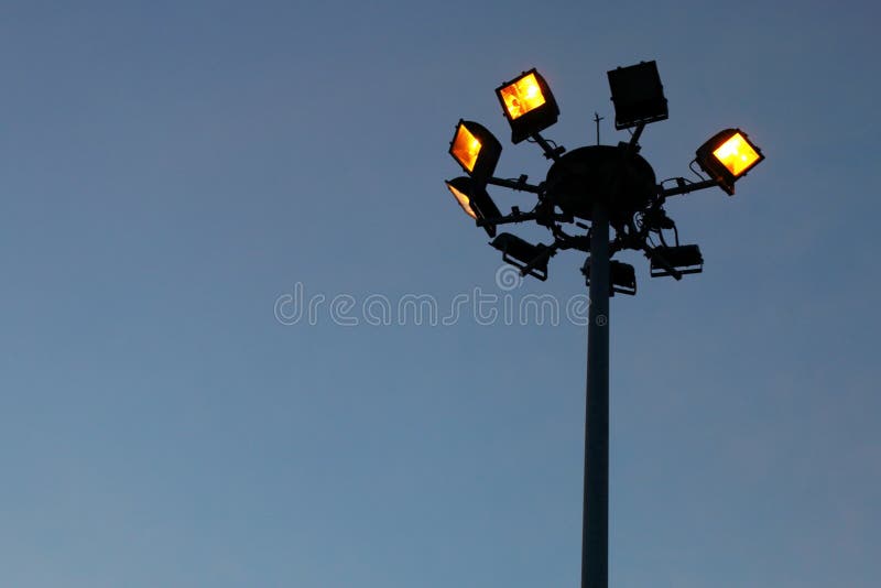 Light pole in evening time stock image. Image of orange - 57872057