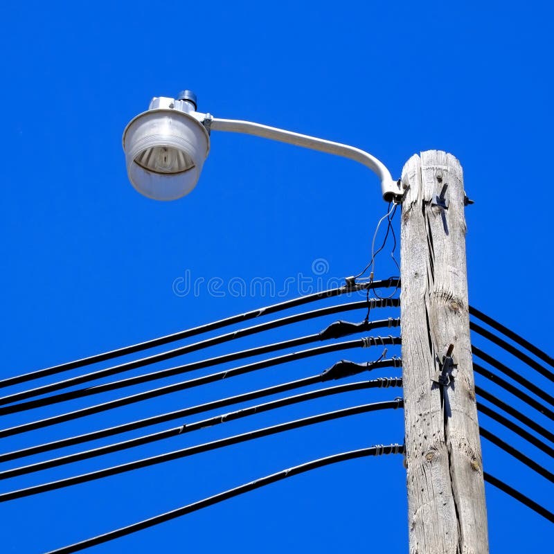 Light Pole with Power Lines and Blue Sky Stock Image - Image of ...