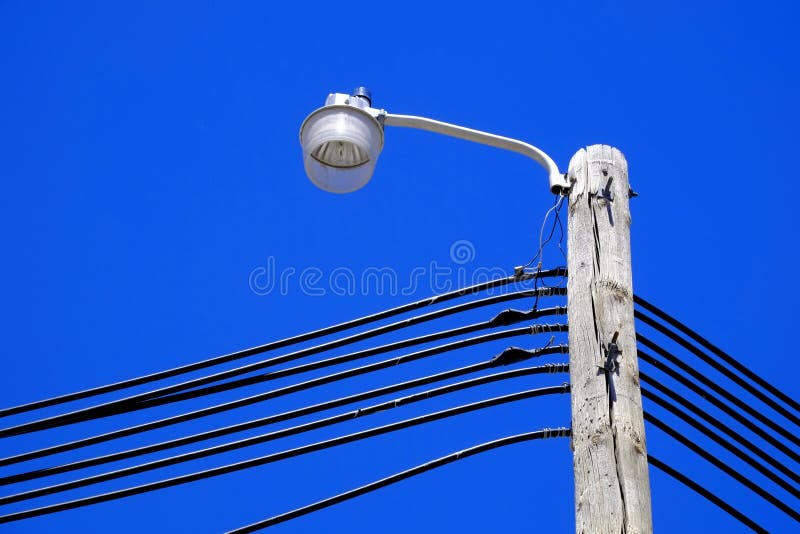 Light Pole with Power Lines and Blue Sky Stock Photo - Image of light ...