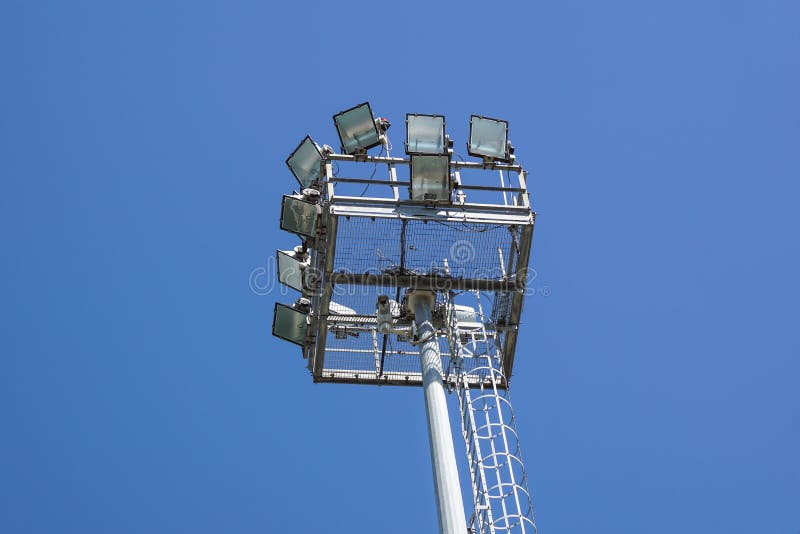 Spotlight Tower Against Blue Sky. Street Lamp. Modern Light Pole Stock ...