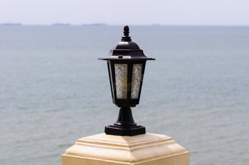 Light Poles Along the Beach. Stock Image - Image of glass, park: 26305101