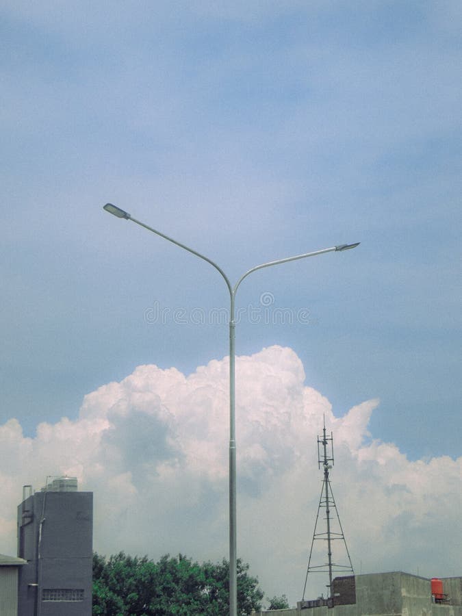 Light Poles with Beautiful Cloud Behind Stock Photo - Image of light ...