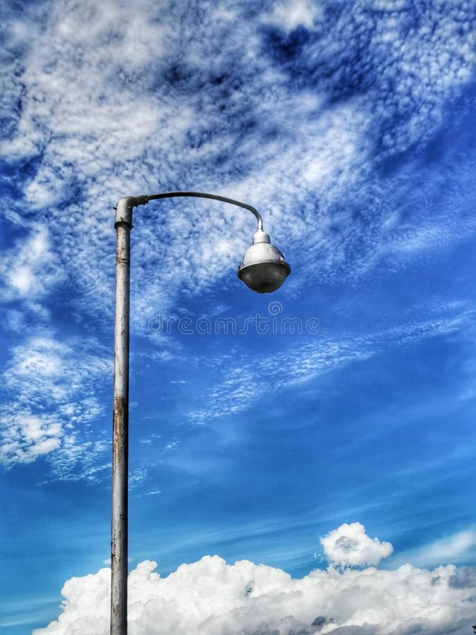 Light Poles with the Blue Sky Stock Photo - Image of cloud, sunlight ...
