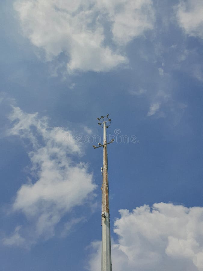 Light Pole in Sunny Day Full of Clouds Stock Photo - Image of sunny ...