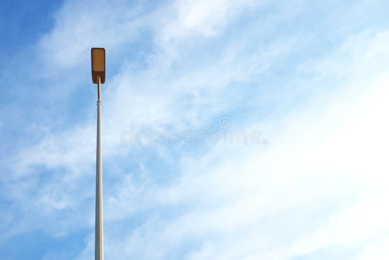 A Light Post Against a Clear Blue Sky. Minimalism and Soaring High ...