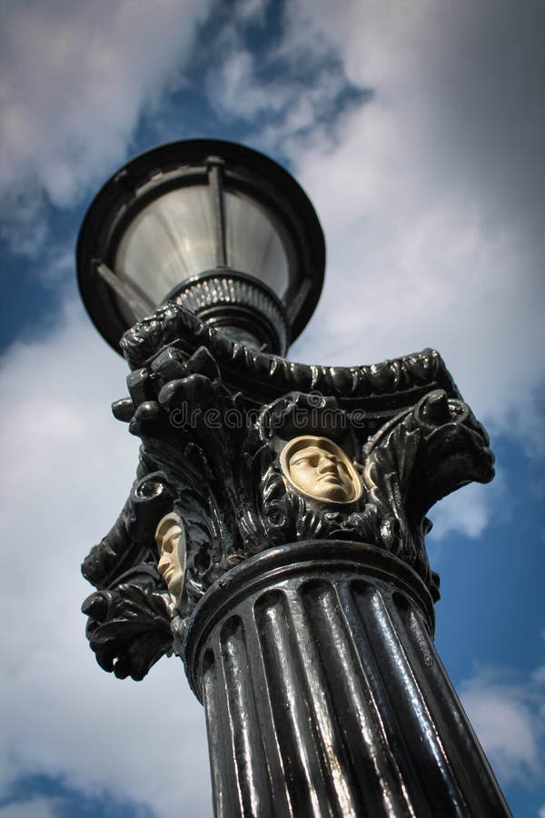 Light post with face stock image. Image of detail, post - 59198017