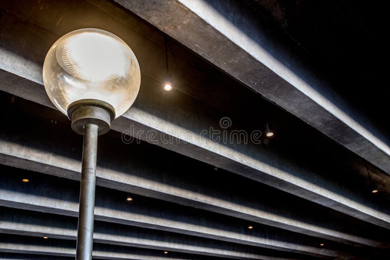 Light Post Under Concrete Beams Stock Image - Image of light, bridge ...