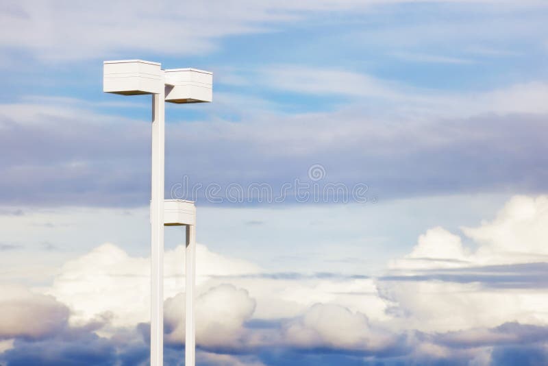 Light Posts and Cloudy Sky stock photo. Image of outdoor - 101976714