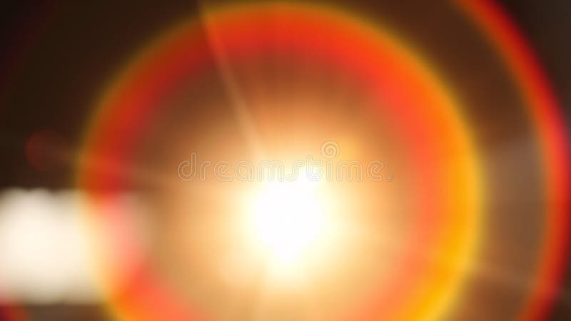 Light Pours from a Warm, Bright Rainbow in Blur on a Black Background ...