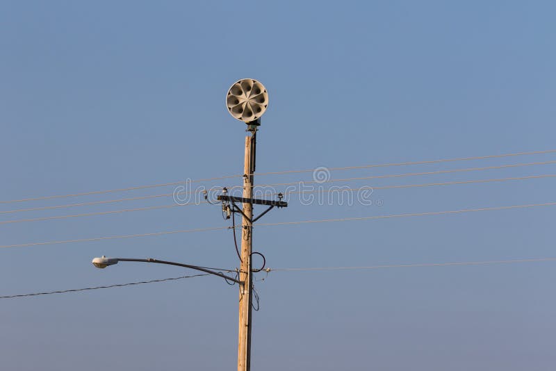 Light, Power Lines and Civil Defense on a Pole Stock Image - Image of ...