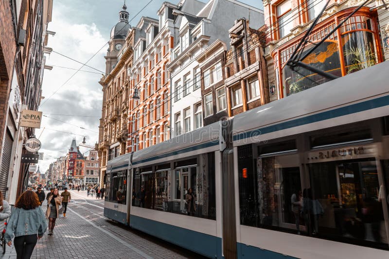 Light Rail Electric Tram Carrying Passengers in Amsterdam, NL Editorial ...