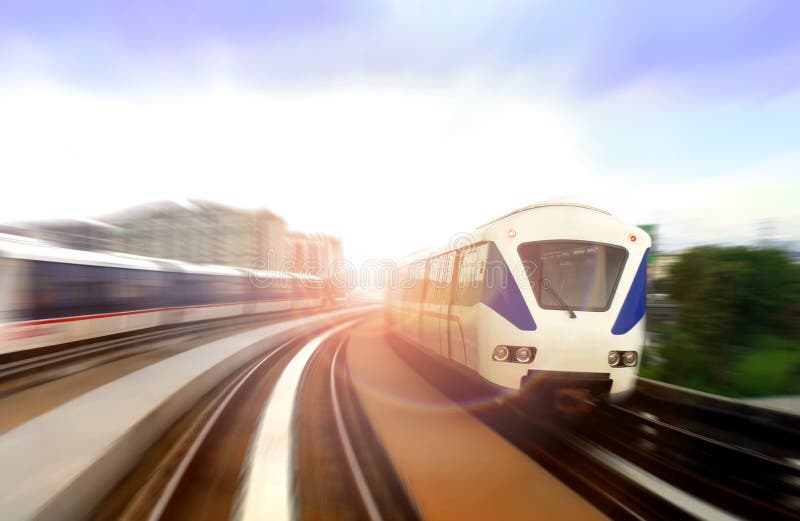 Light Rail Train on the Move with Bright Sunlight Glare Stock Image ...