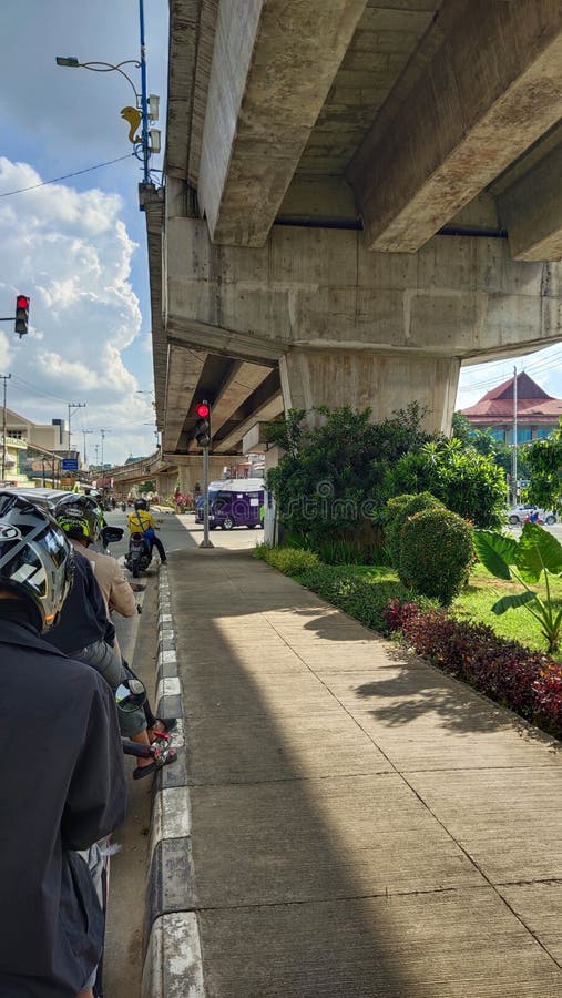 Light Rail Transit Bridge and Traffic Lights in a Bustling City ...