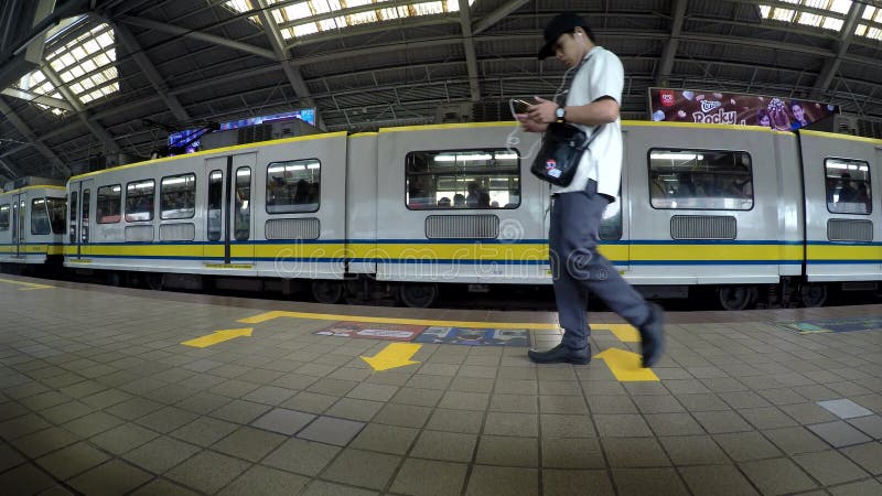Light Railway Transit Train LRT Approaching the Railroad Terminal Stock ...