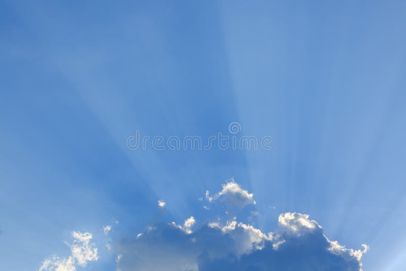 Light rays on blue sky stock image. Image of fluffy, cloudscape - 72789699