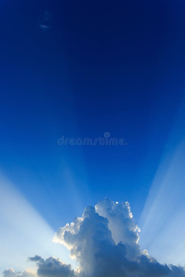 Light Rays Explosion on Clear Blue Sky Stock Photo - Image of overcast ...