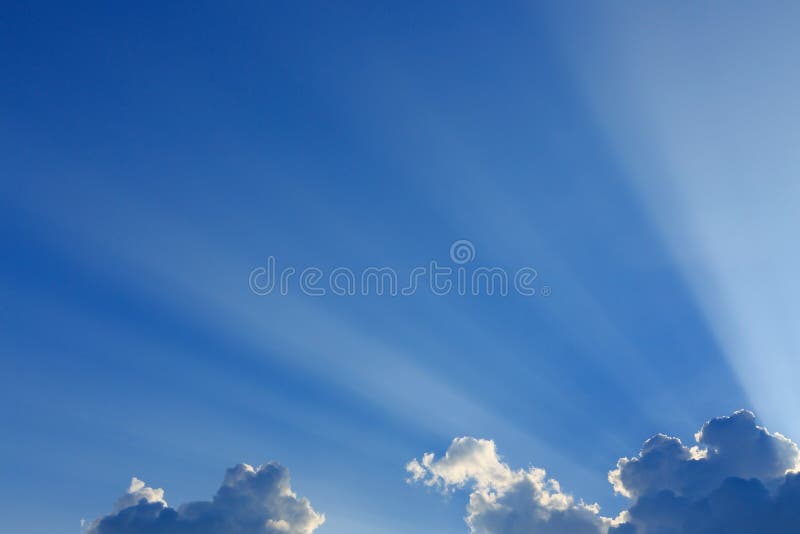 Light Rays Explosion on Clear Blue Sky Stock Photo - Image of glow ...