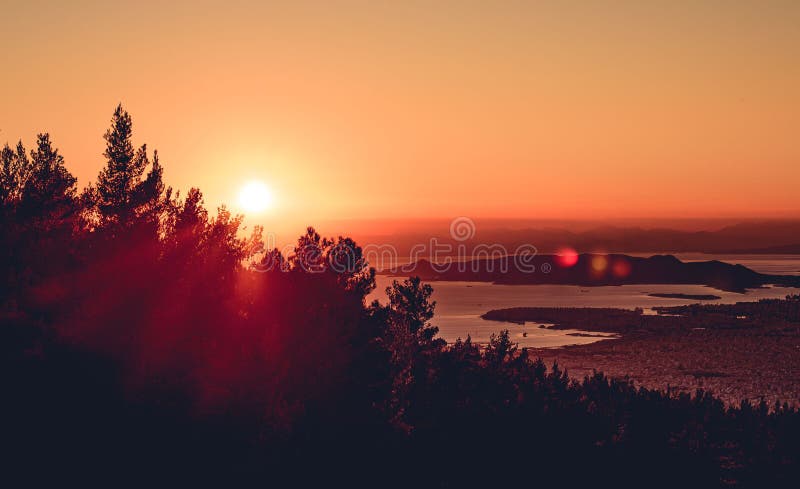 Light Rays Falling on Trees with the Sunset Over the City of Athens and ...