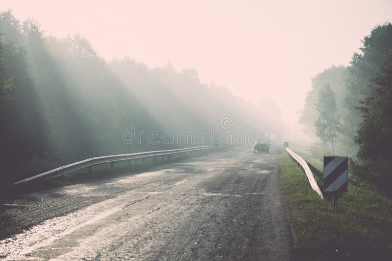 Light Rays in Fog Over the Road - Vintage Effect Stock Photo - Image of ...