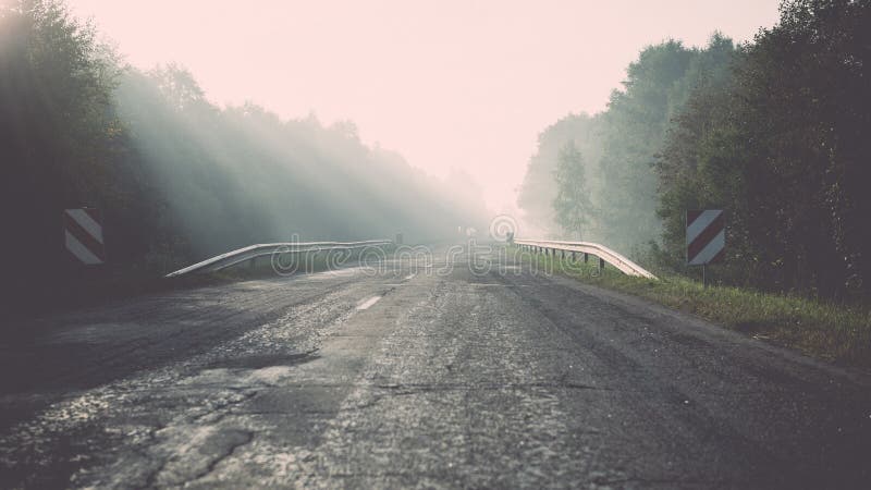 Light Rays in Fog Over the Road - Vintage Effect Stock Image - Image of ...