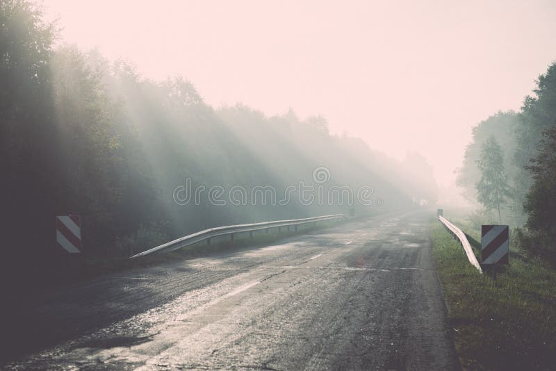 Light Rays in Fog Over the Road - Vintage Effect Stock Photo - Image of ...