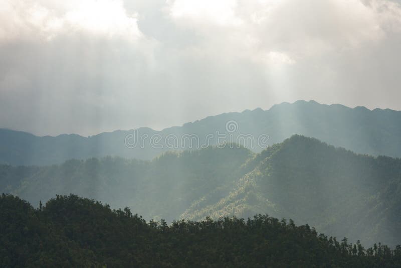 Light Rays Over Mountain Landscape Stock Photo - Image of layers, rural ...