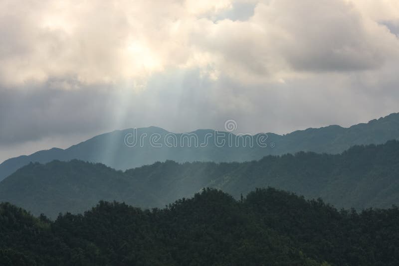 Light Rays Over Mountain Landscape Stock Image - Image of clouds, haze ...