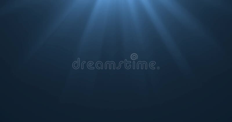 Light Rays, Seamless Loop of Deep Blue Ocean Waves from Underwater ...